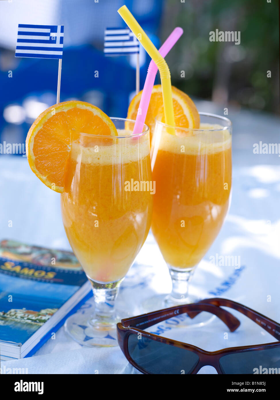 Orange juice drinks in a Greek tavern Stock Photo - Alamy