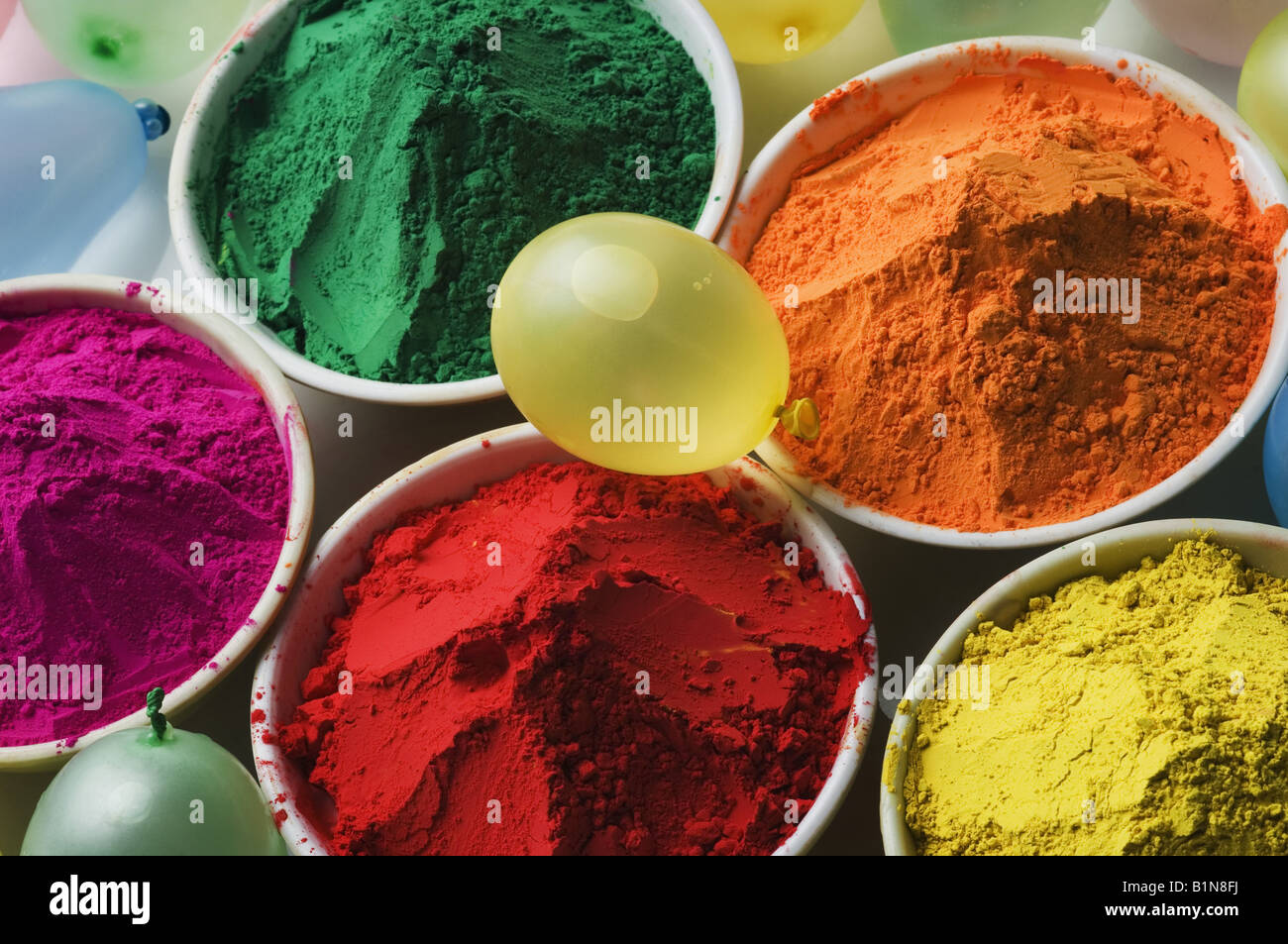 Close-up of water bombs and bowls of powder paint Stock Photo - Alamy
