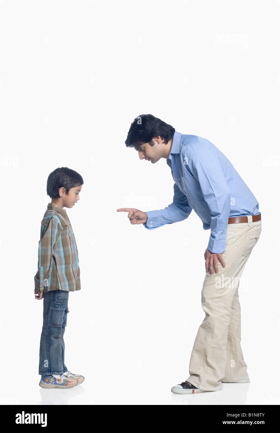 Side profile of a young man shouting on his son Stock Photo - Alamy