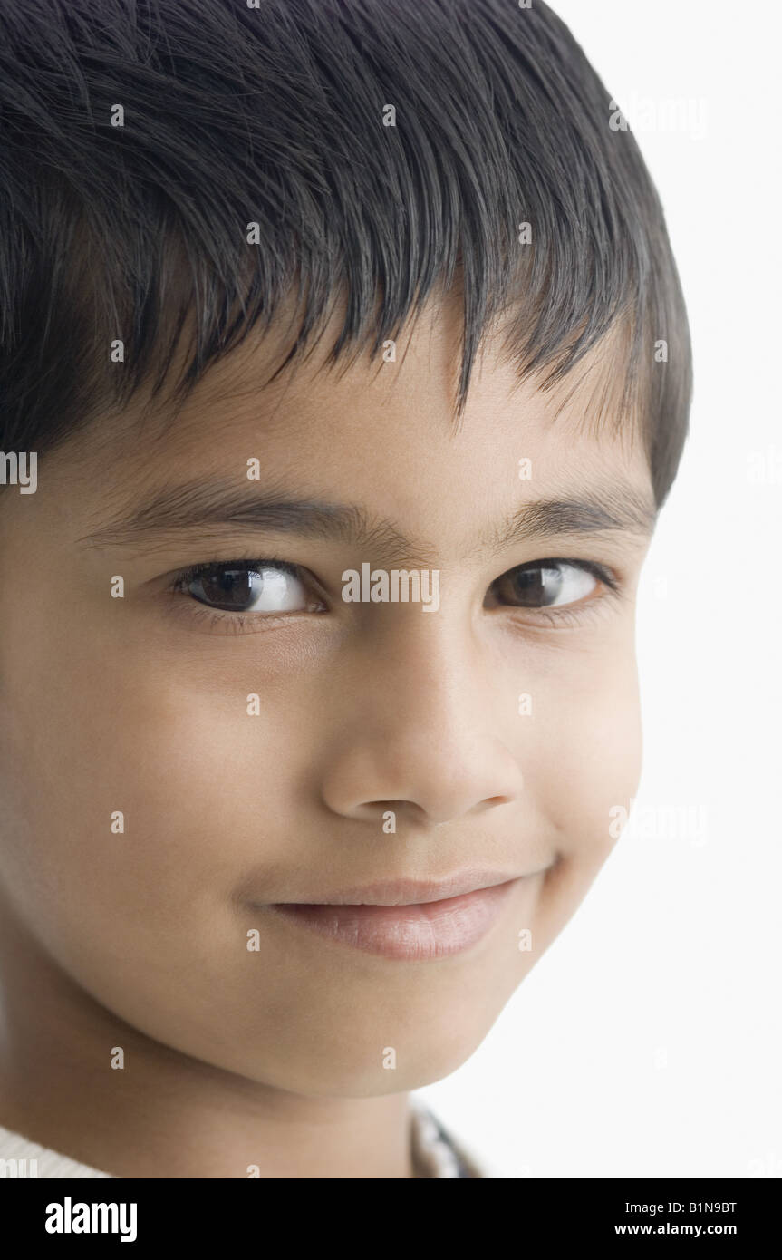 Portrait of a boy smiling Stock Photo - Alamy
