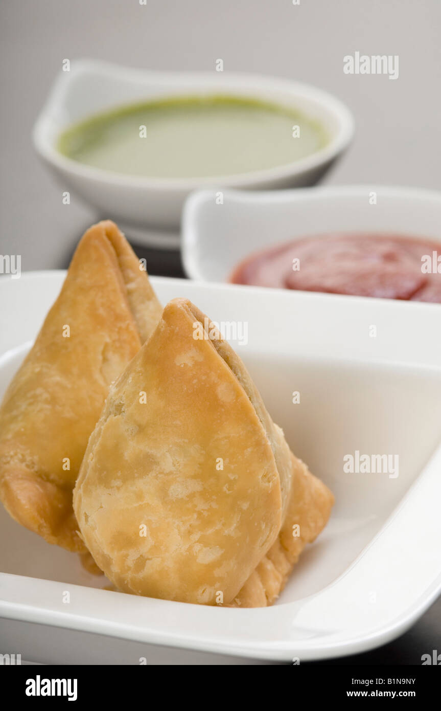 Samosa snack tomato ketchup hi-res stock photography and images - Alamy
