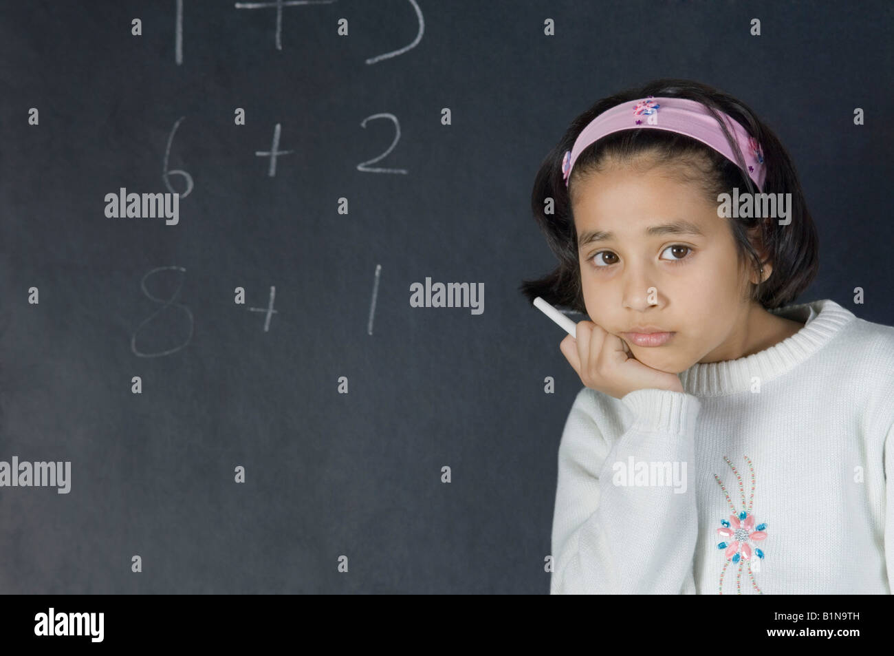 Indian school girl student thinking hi-res stock photography and images ...