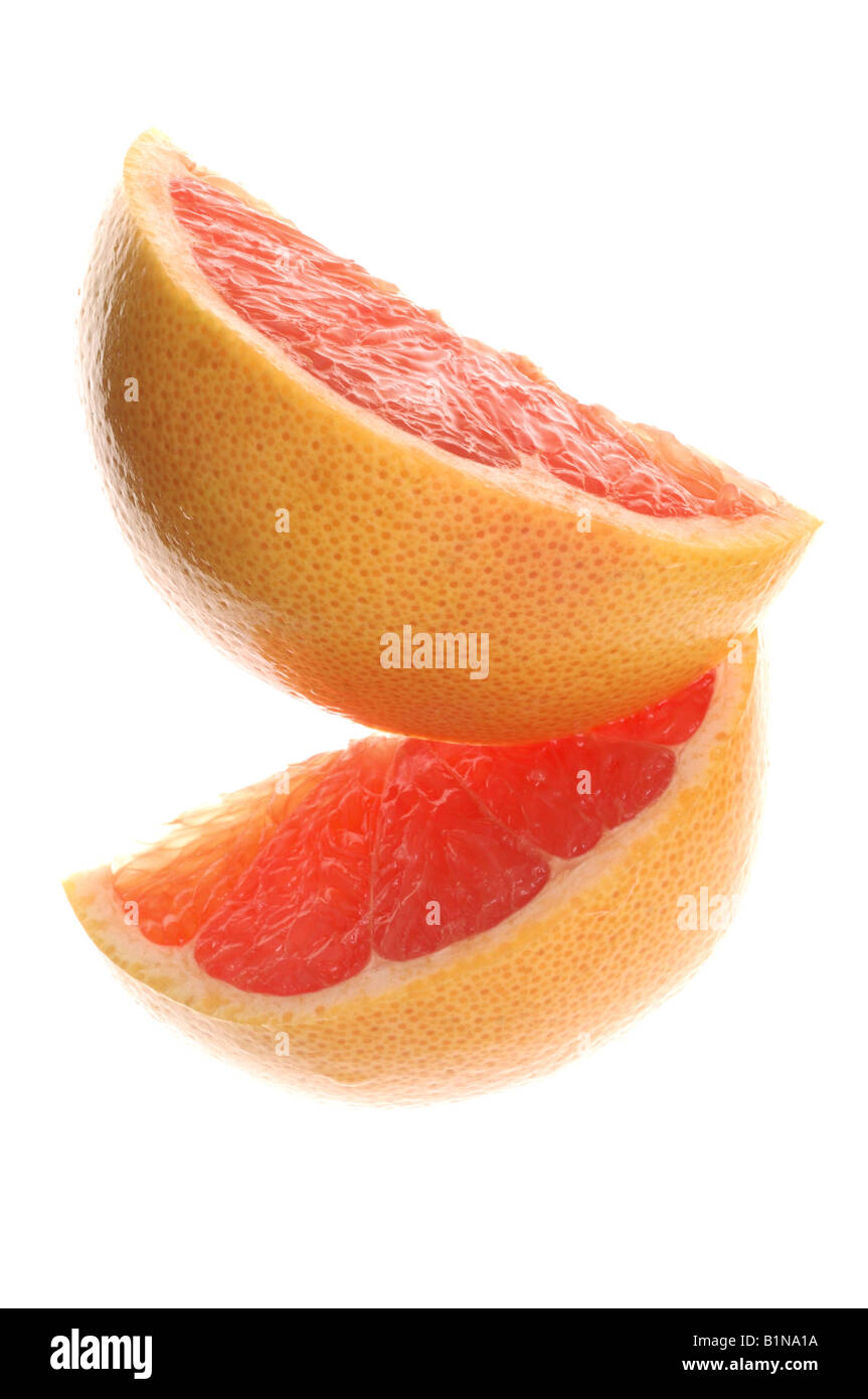 Two pieces of grapefruit Stock Photo - Alamy