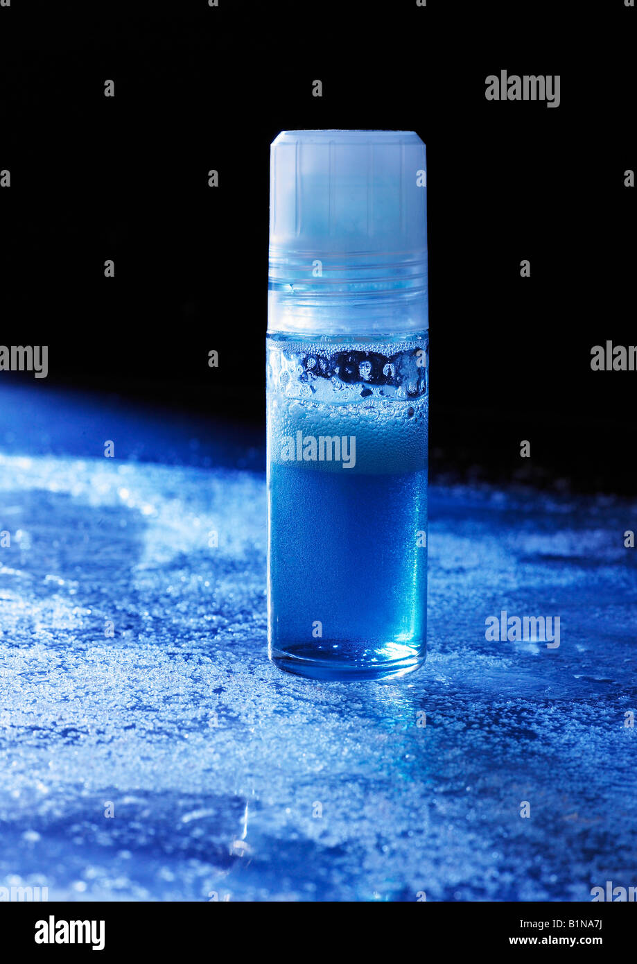 A small bottle of perfume Stock Photo - Alamy