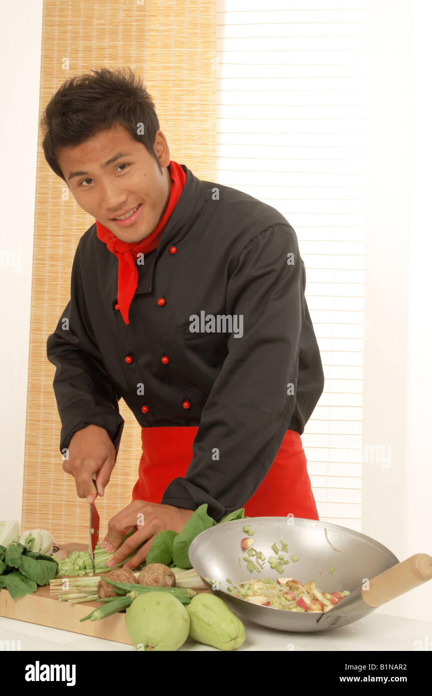 Asian cook is preparing vegetables Stock Photo - Alamy