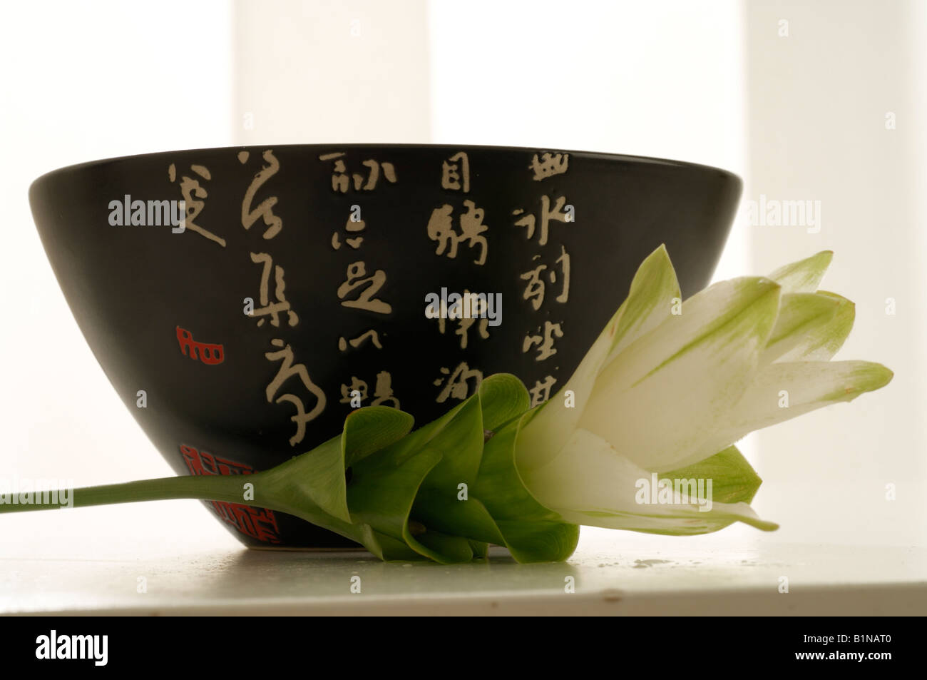 Bowl with Asian character pattern Stock Photo - Alamy