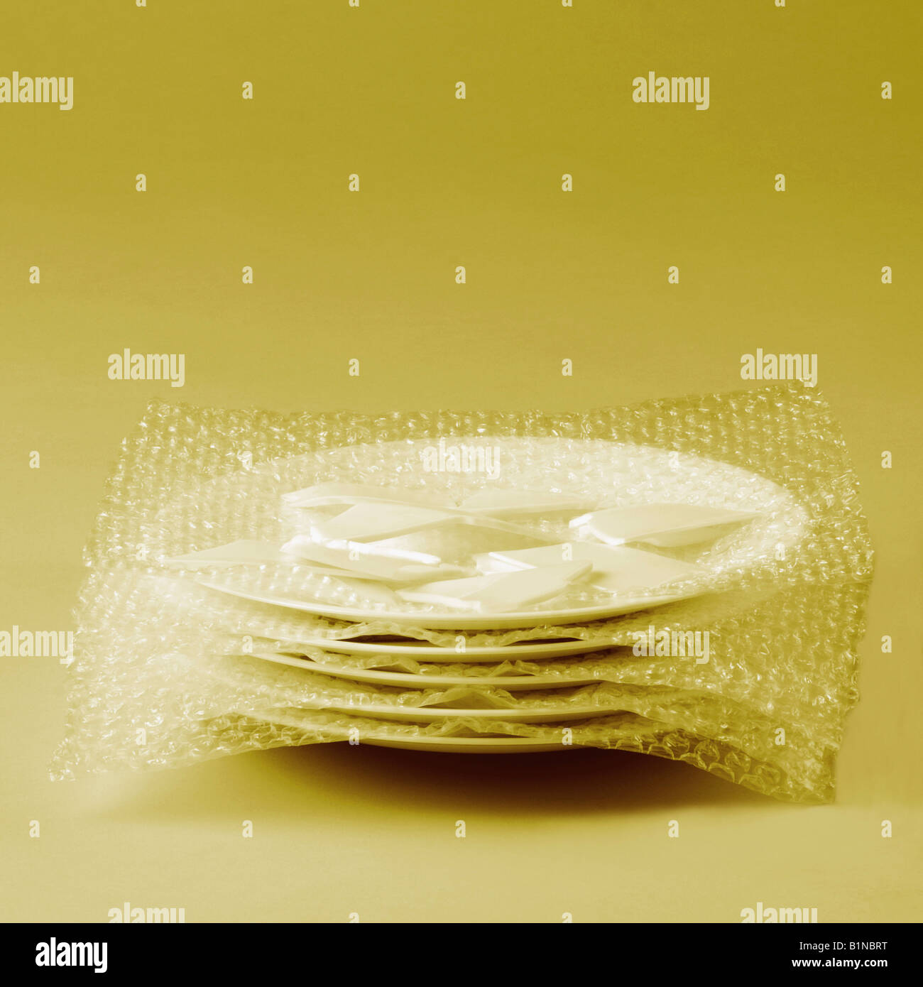 Wrapping plates hi-res stock photography and images - Alamy