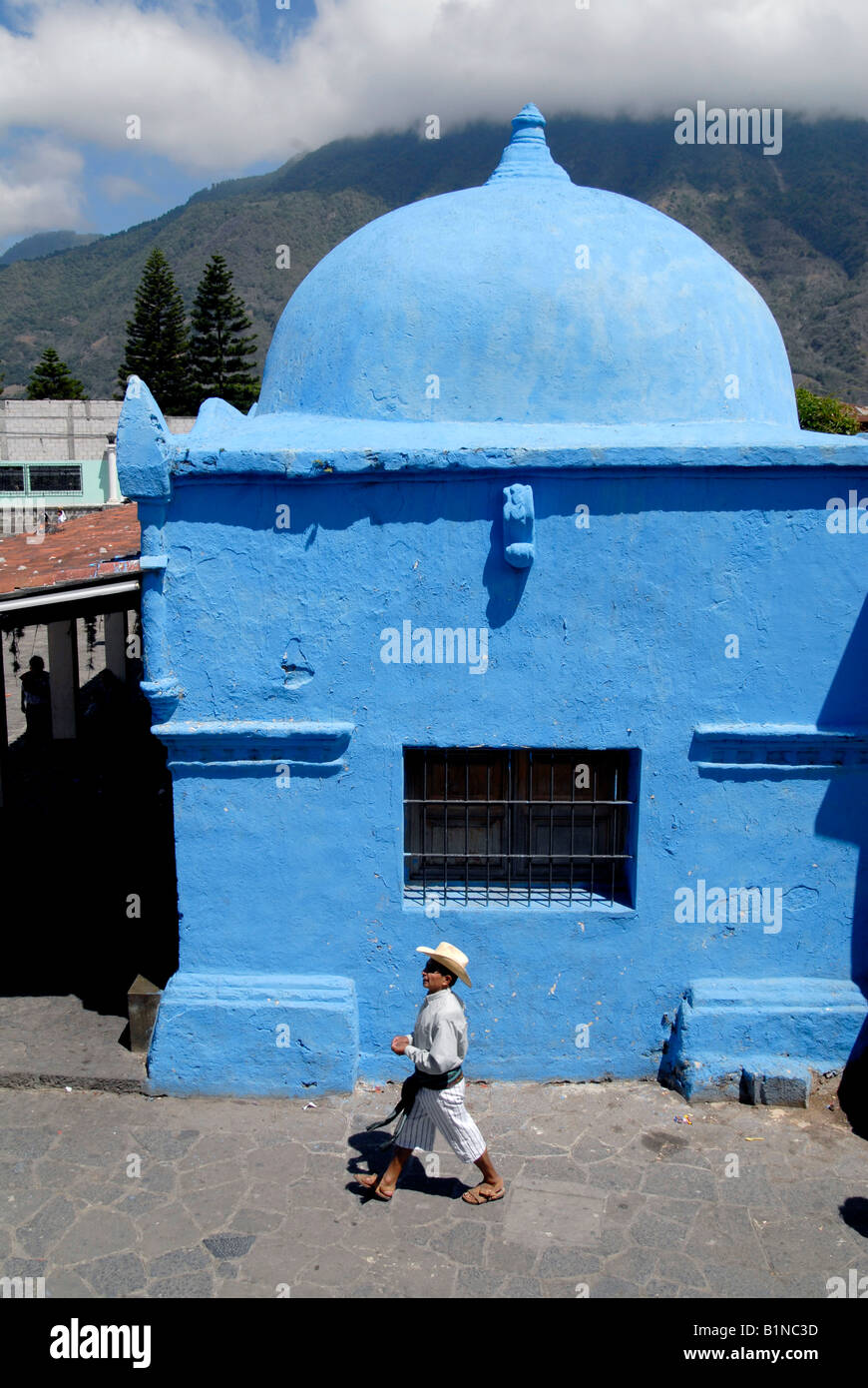 GUATEMALA NATIVE QUICHE MAN WALKING IN THE COLONIAL STREETS OF SANTIAGO ...