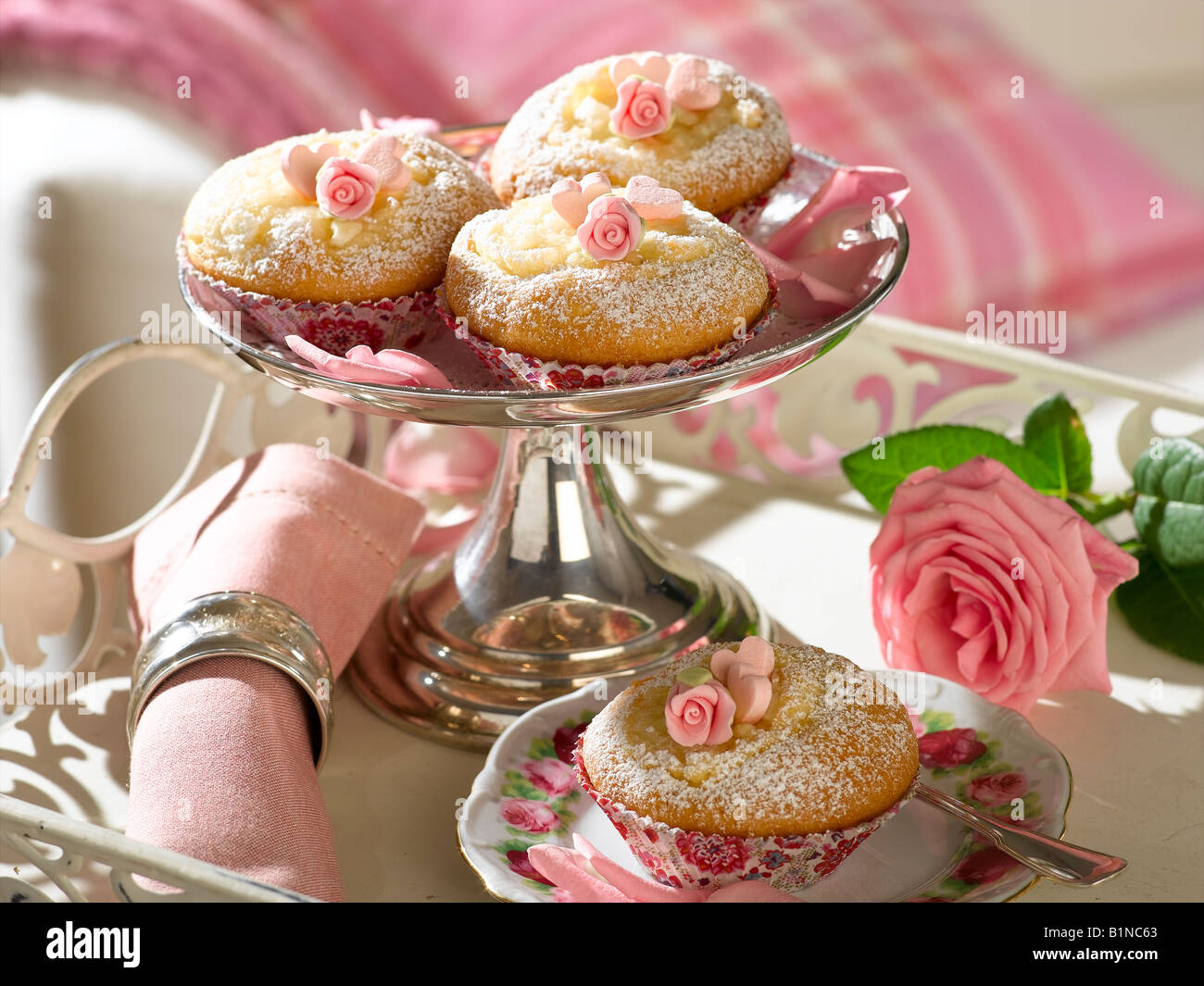 Muffins in a small silver cup Stock Photo - Alamy