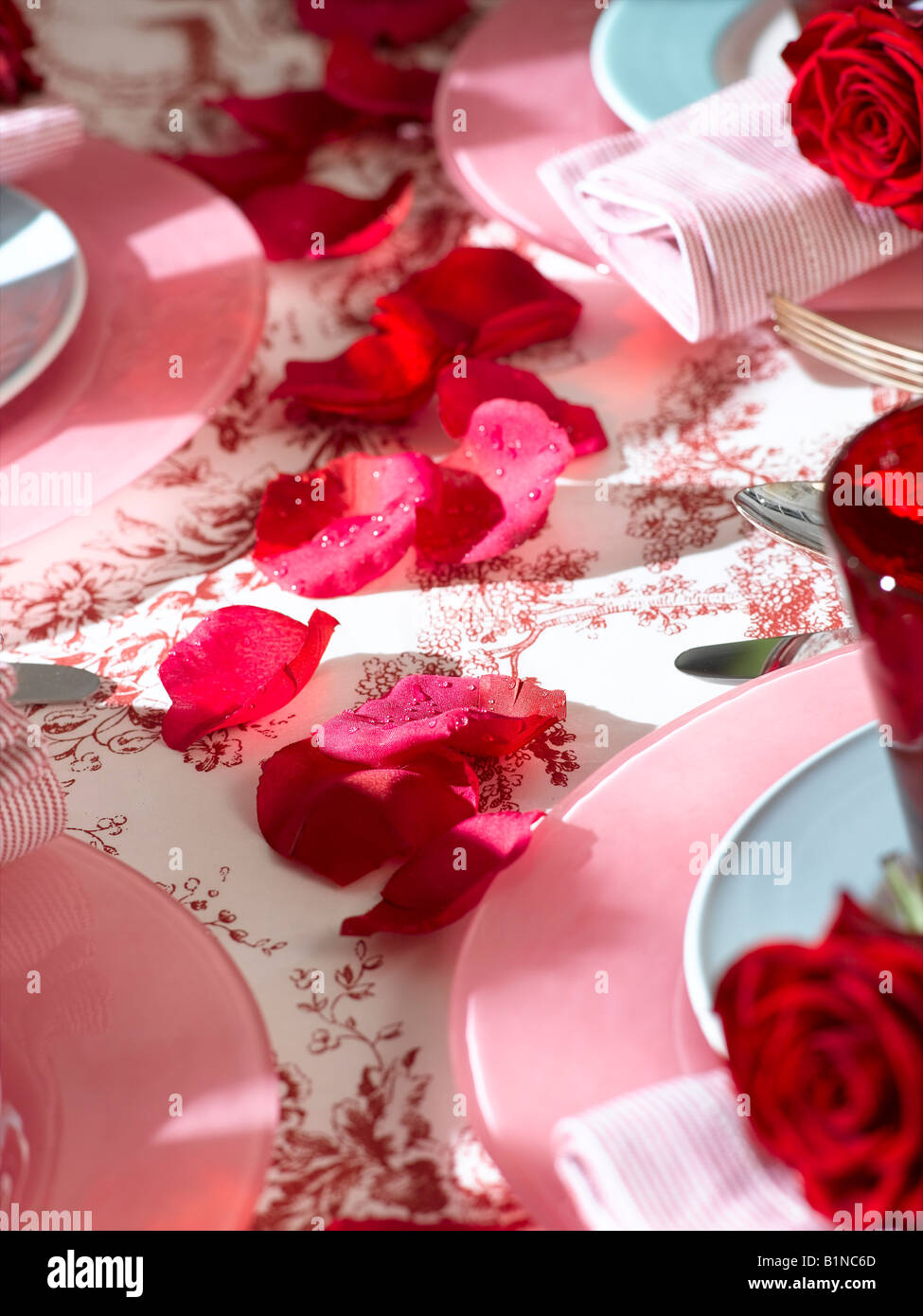 Rose petal table decoration Stock Photo - Alamy