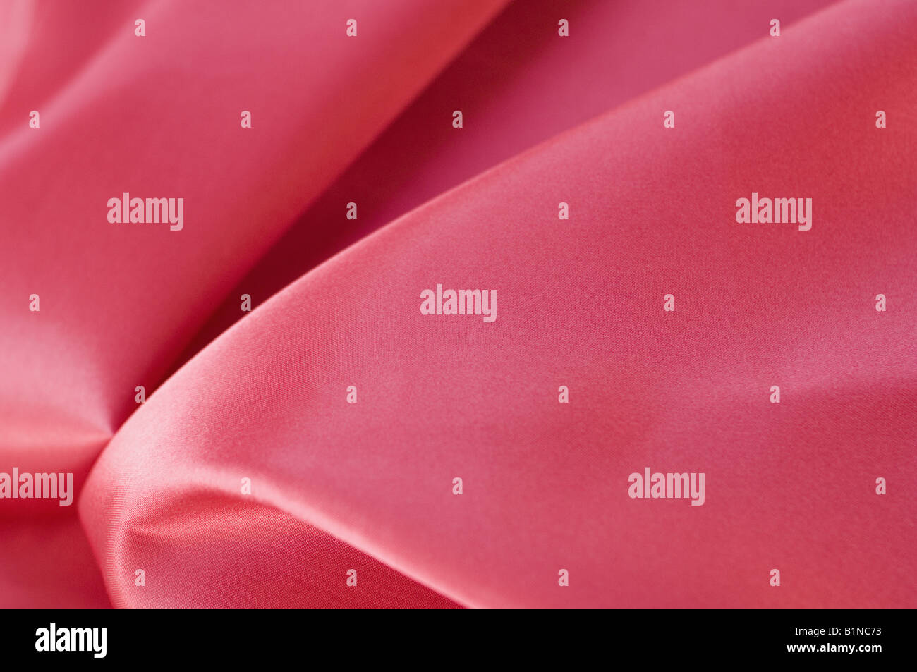 Close-up of crumpled pink satin Stock Photo - Alamy