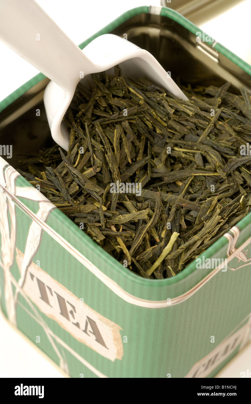 Green tea in a tea caddy Stock Photo - Alamy