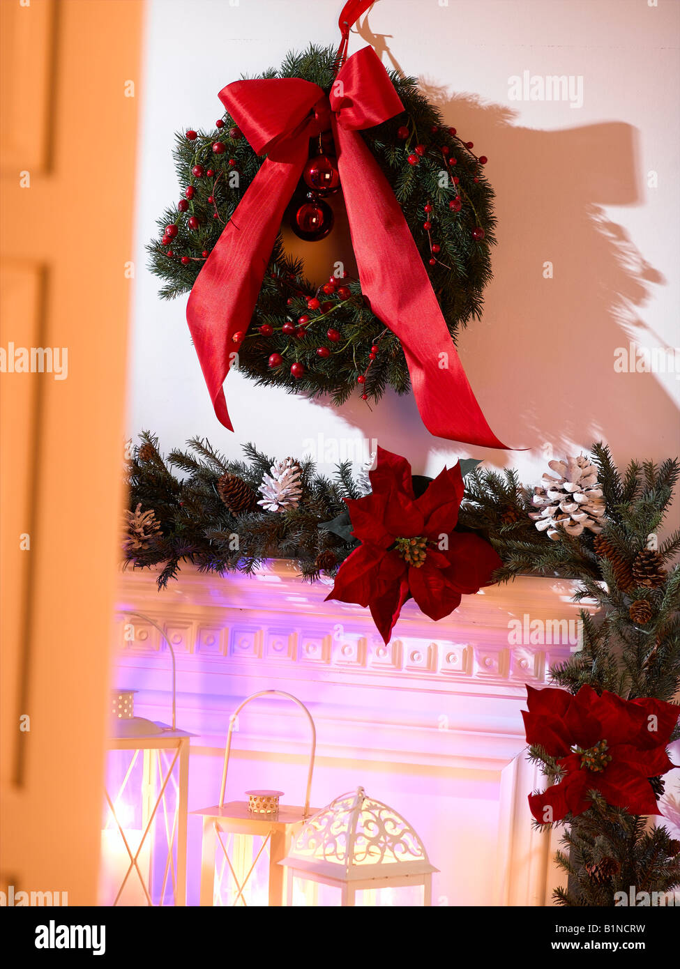 Advent wreath with a red ribbon hanging on the wall Stock Photo - Alamy