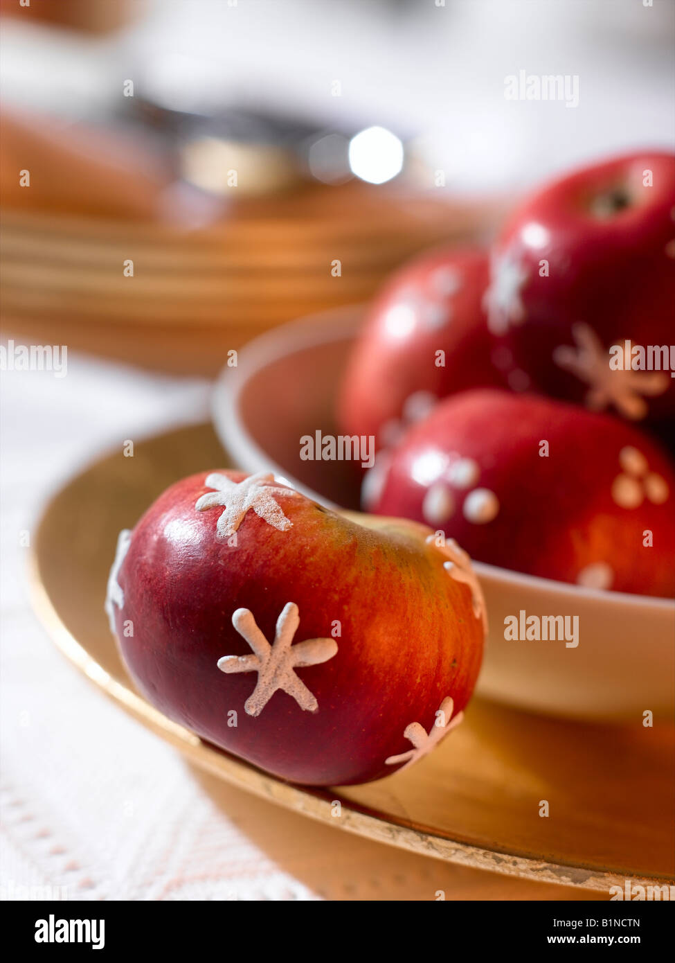 Red apples with a icing sugar pattern Stock Photo - Alamy