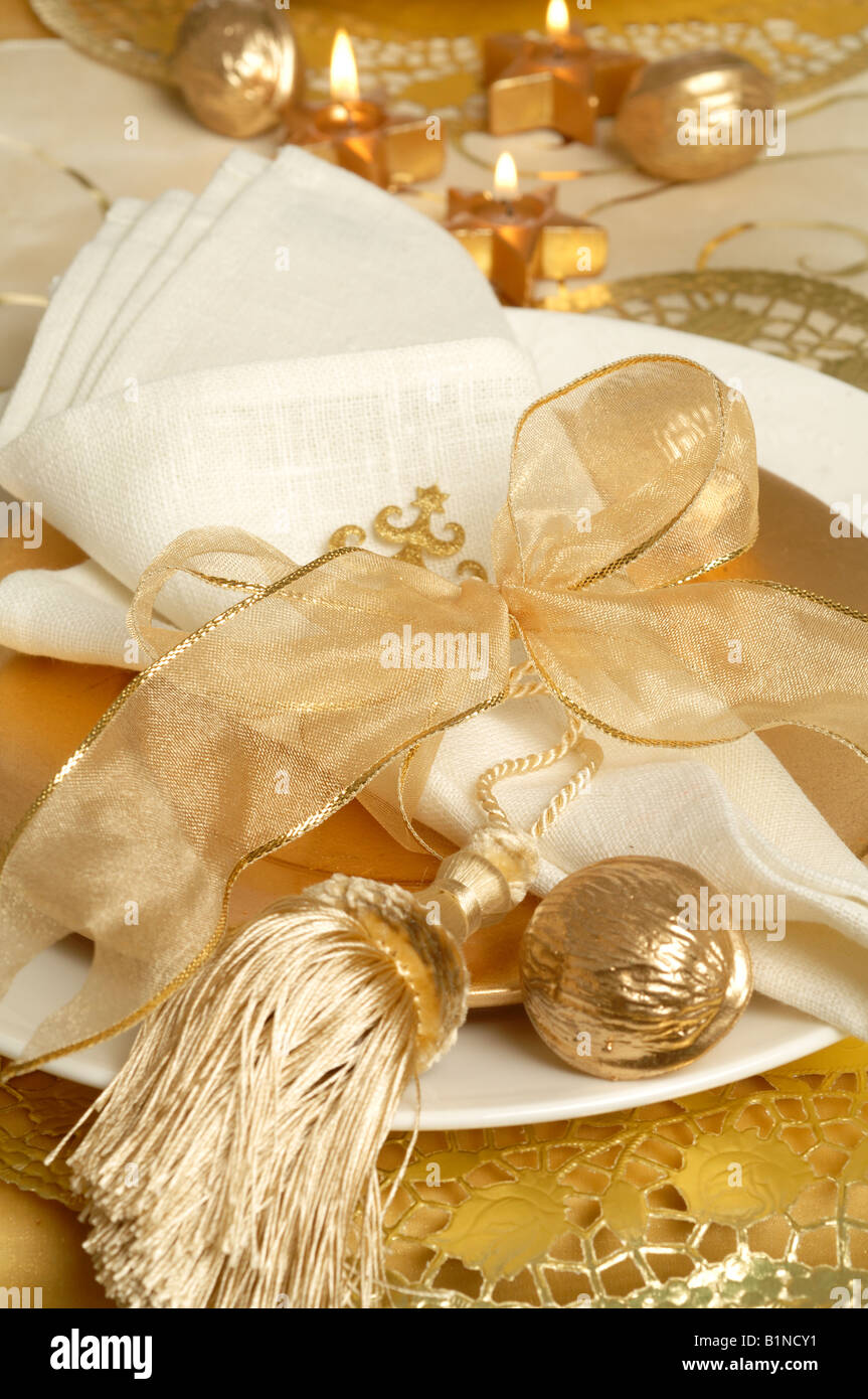 Golden place setting with a tassel Stock Photo - Alamy