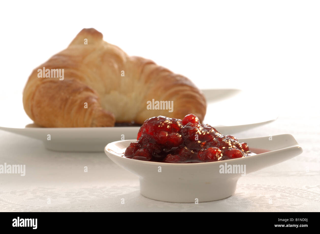 Croissant with jam Stock Photo - Alamy