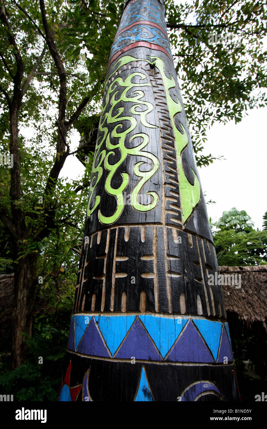GRAPHIC DESIGN ON TIMBER TOTEM POLE IN FIJIAN TRIBAL VILLAGE VERTICAL ...