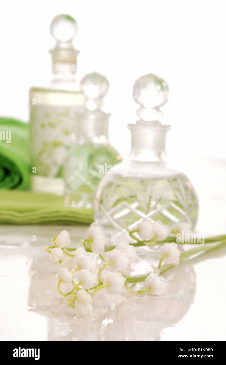 Flakon with lily of the valley fragrance Stock Photo - Alamy