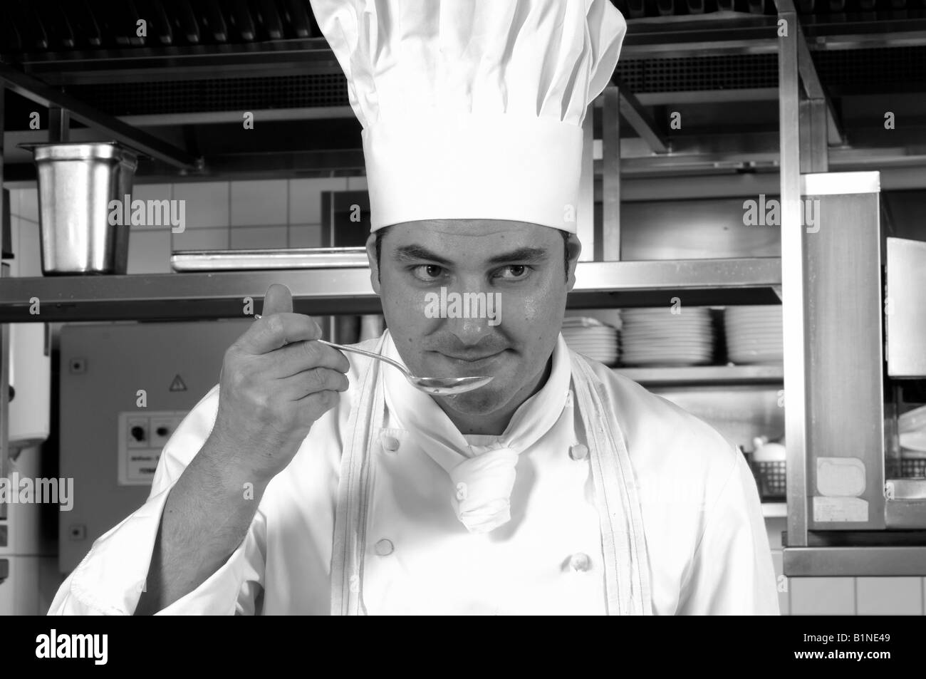 Cook with a spoon Stock Photo - Alamy