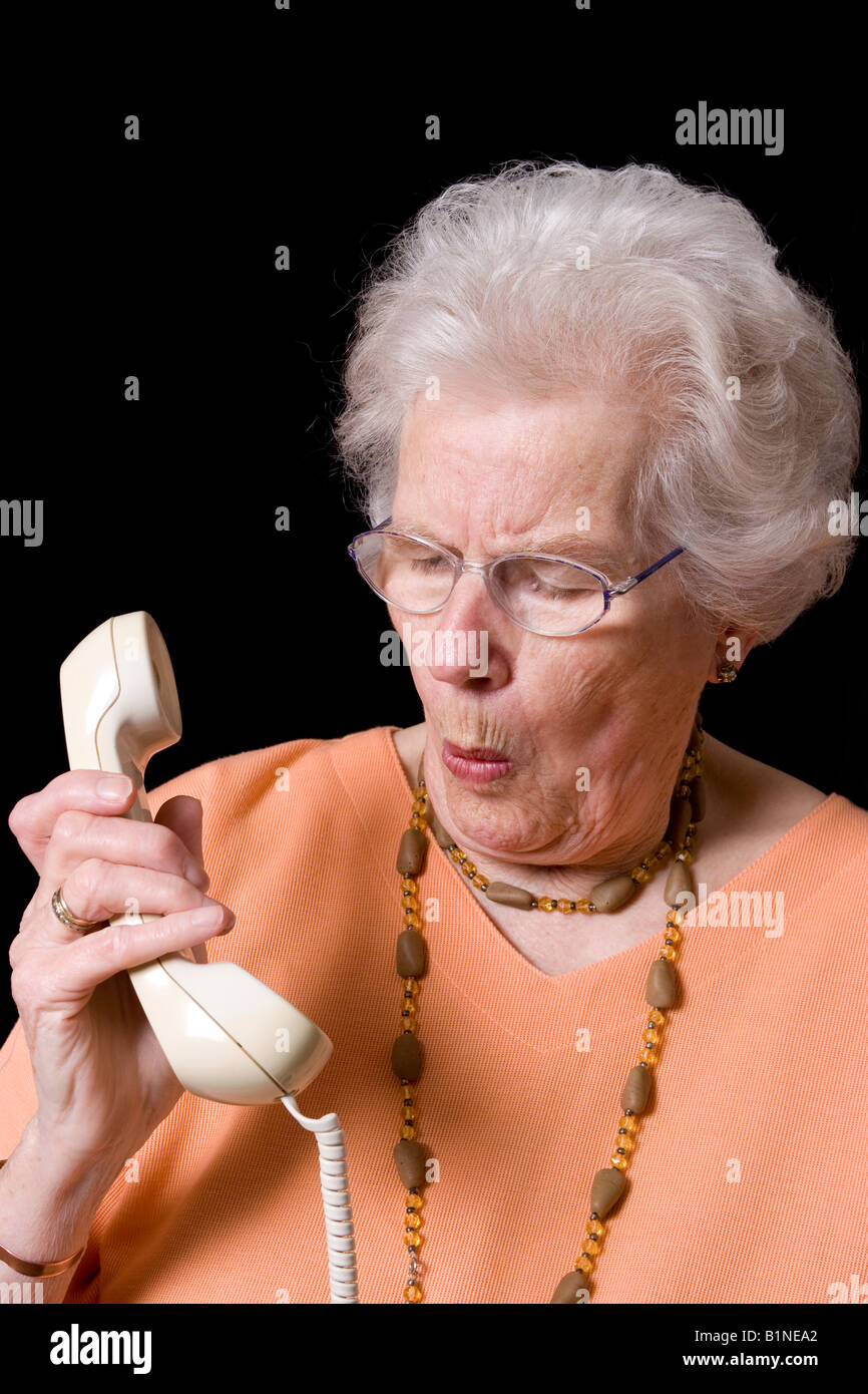 Horrified elderly woman hi-res stock photography and images - Alamy