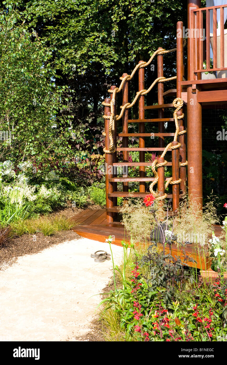 steps up to a raised garden room Stock Photo - Alamy
