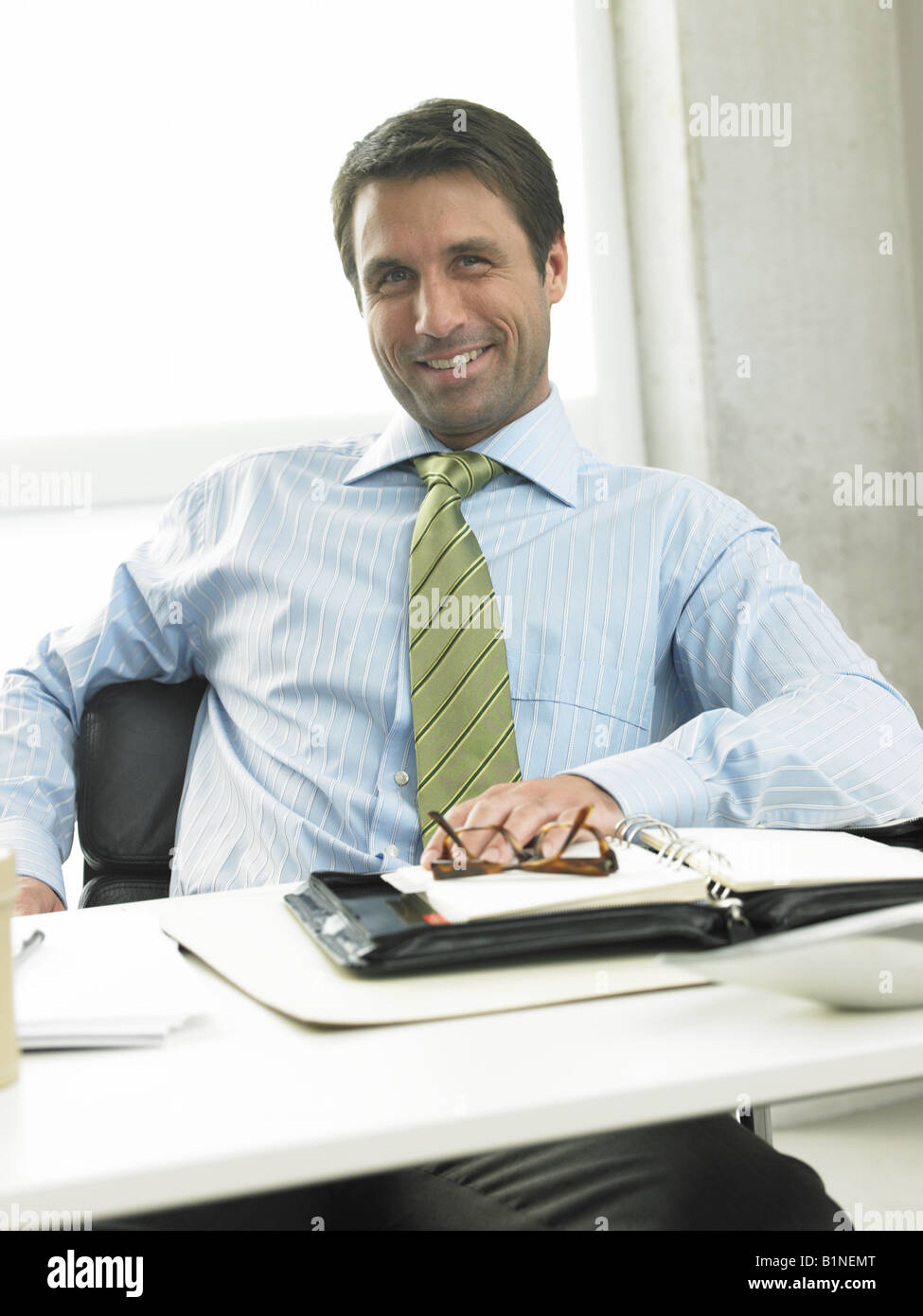 Business man on his desk Stock Photo - Alamy