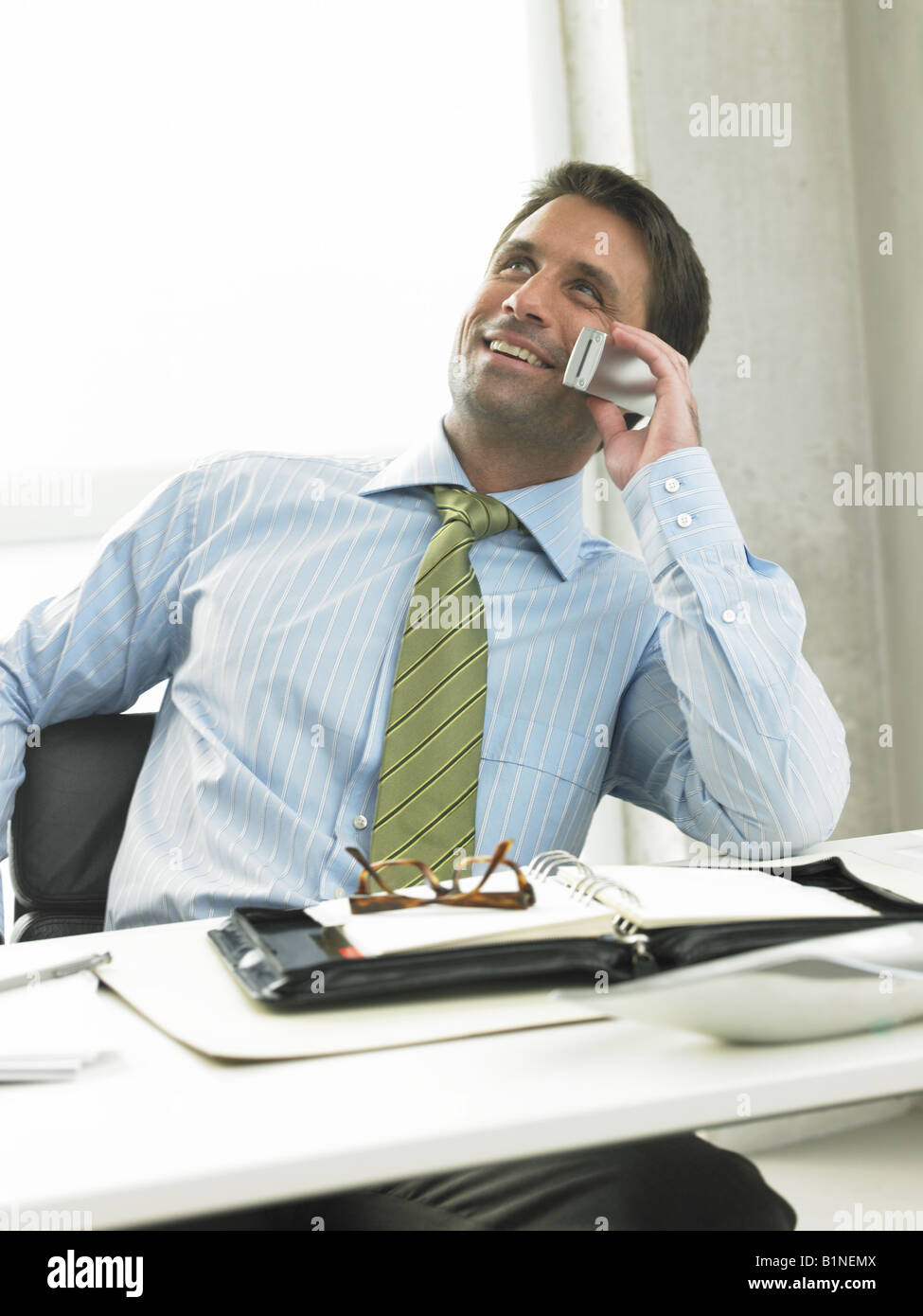 Business man on his desk Stock Photo - Alamy