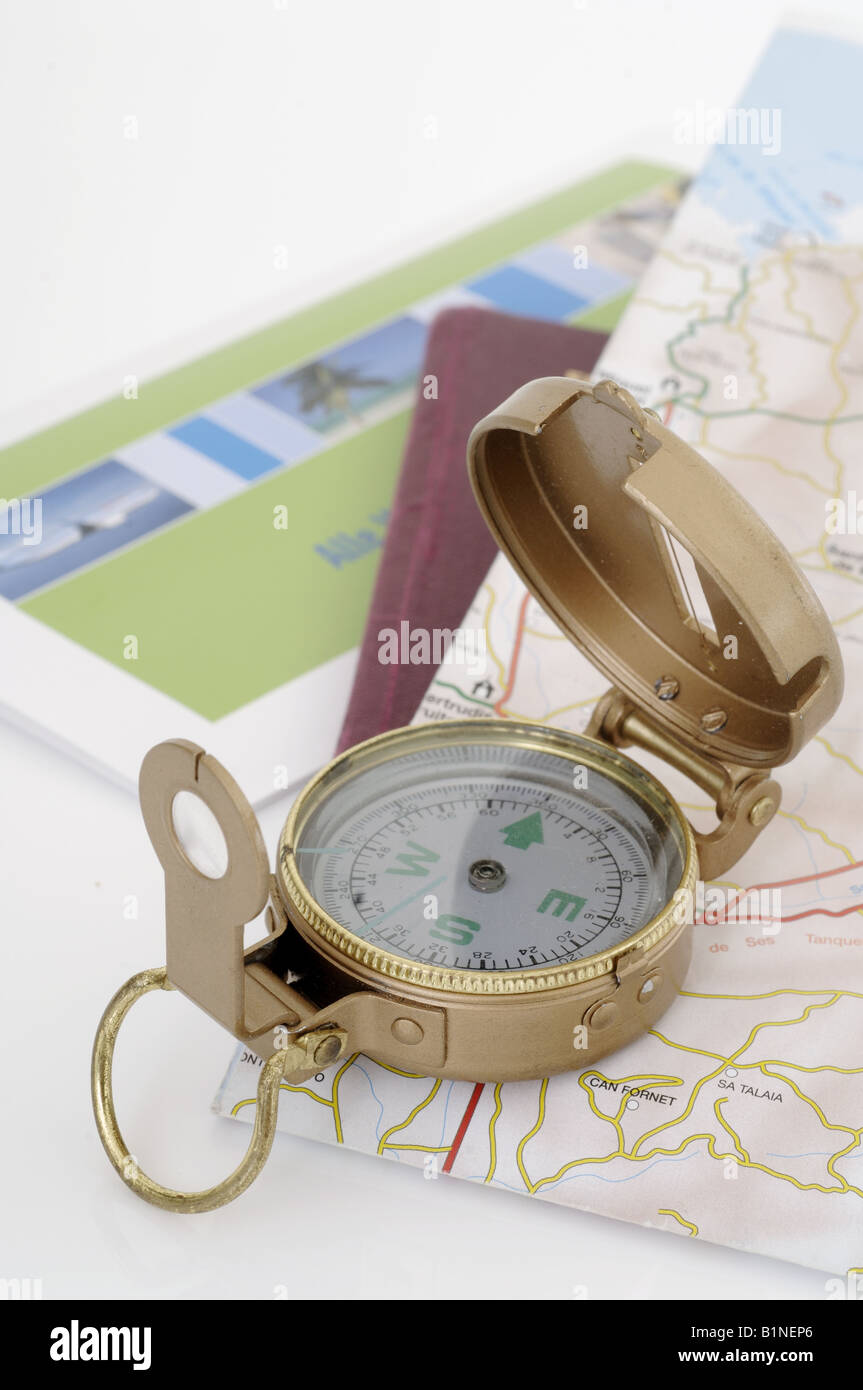 Compas and a map Stock Photo - Alamy