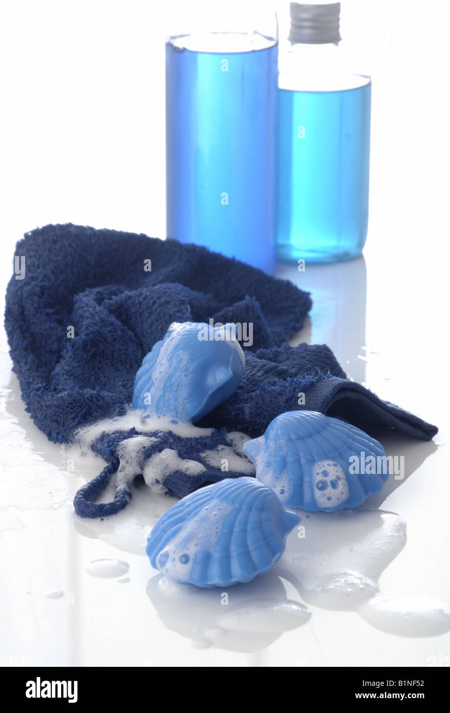 Sea shell shaped soap and towel Stock Photo - Alamy