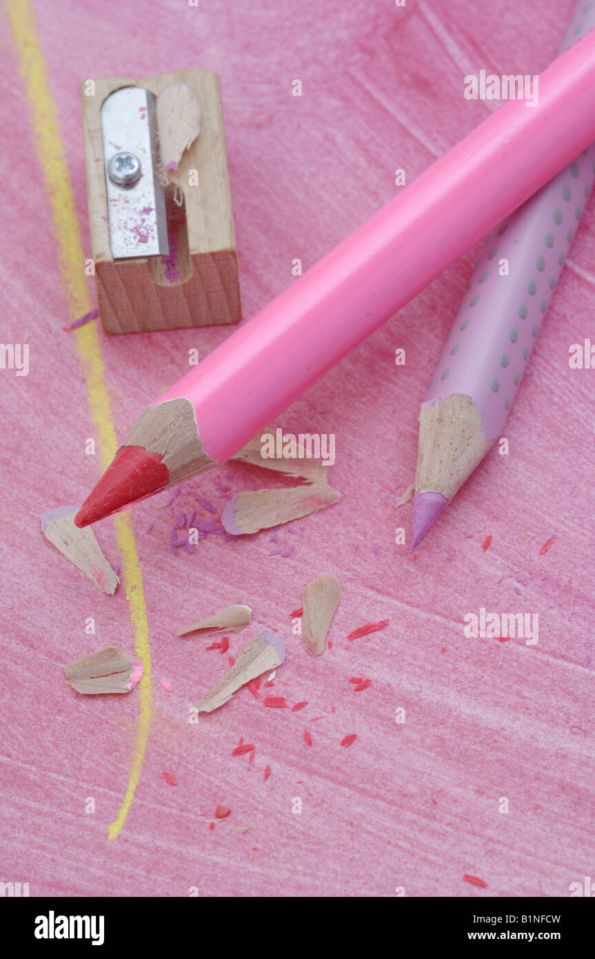Crayons and pencil sharpener Stock Photo - Alamy