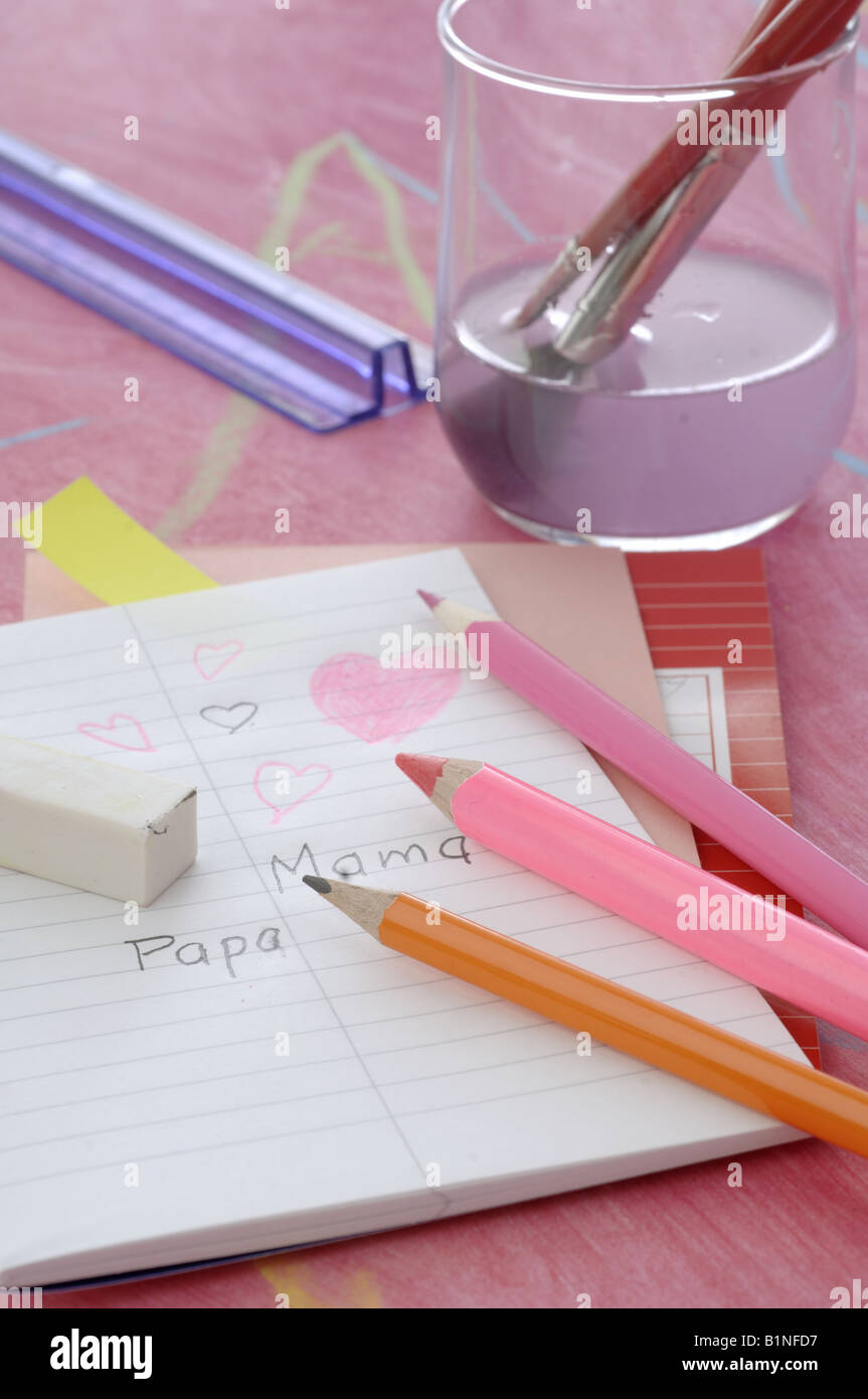 Crayons and paper Stock Photo - Alamy