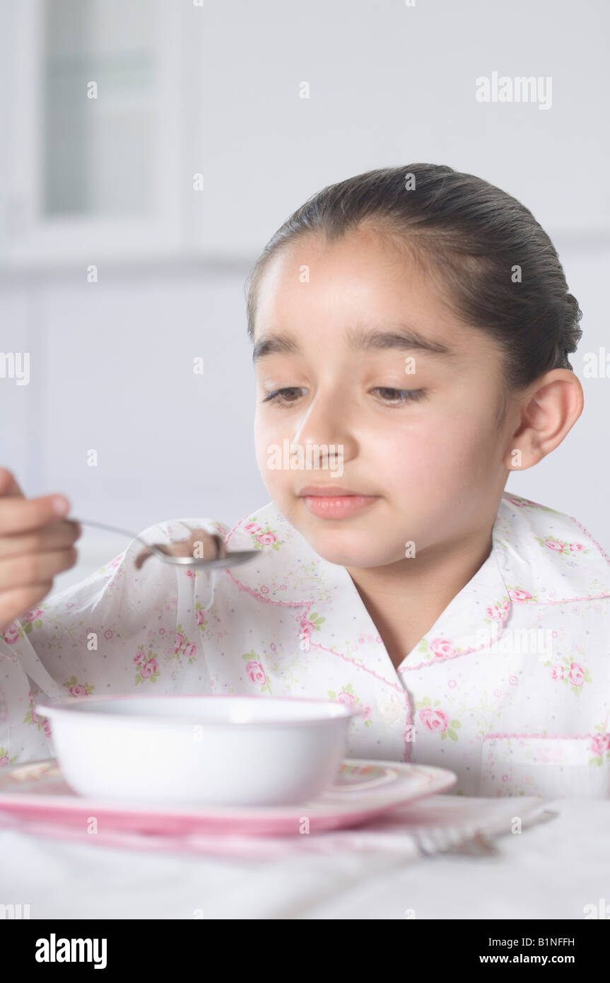 Close-up of a girl eating food Stock Photo - Alamy
