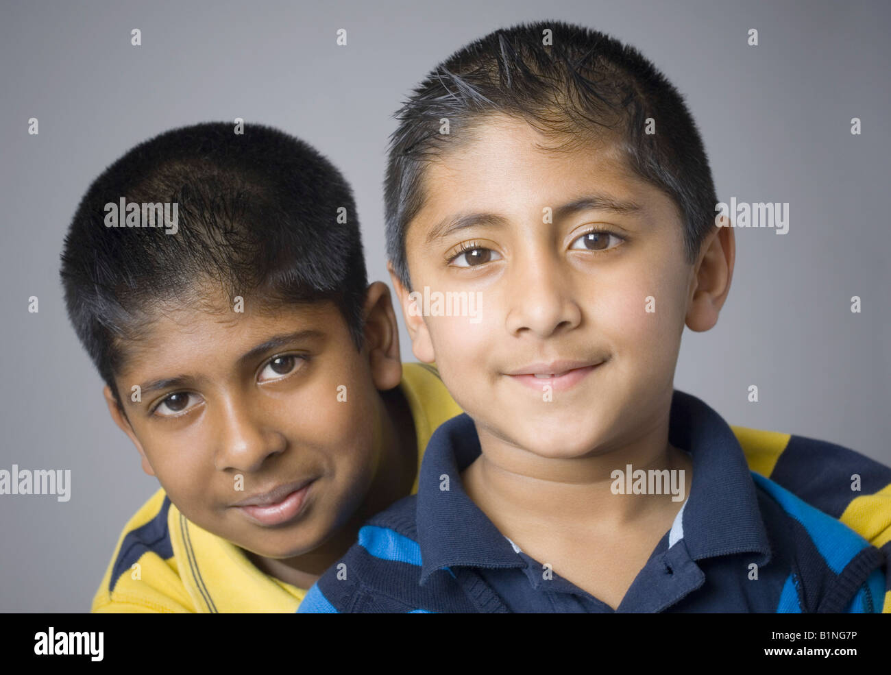 Portrait of two boys smiling Stock Photo - Alamy