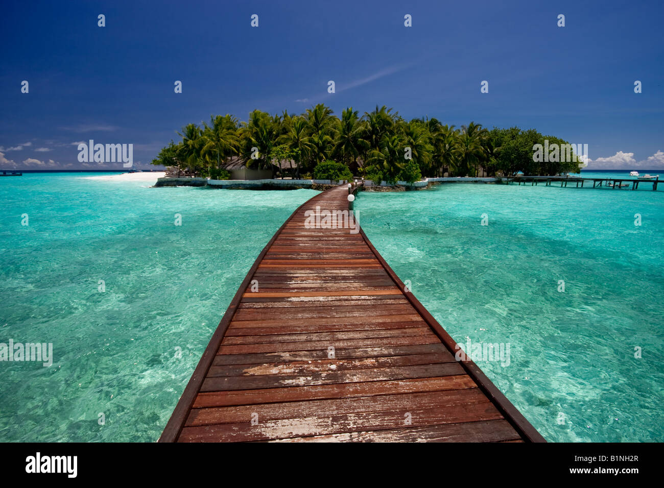 walkway leading to tropical island resort Stock Photo - Alamy