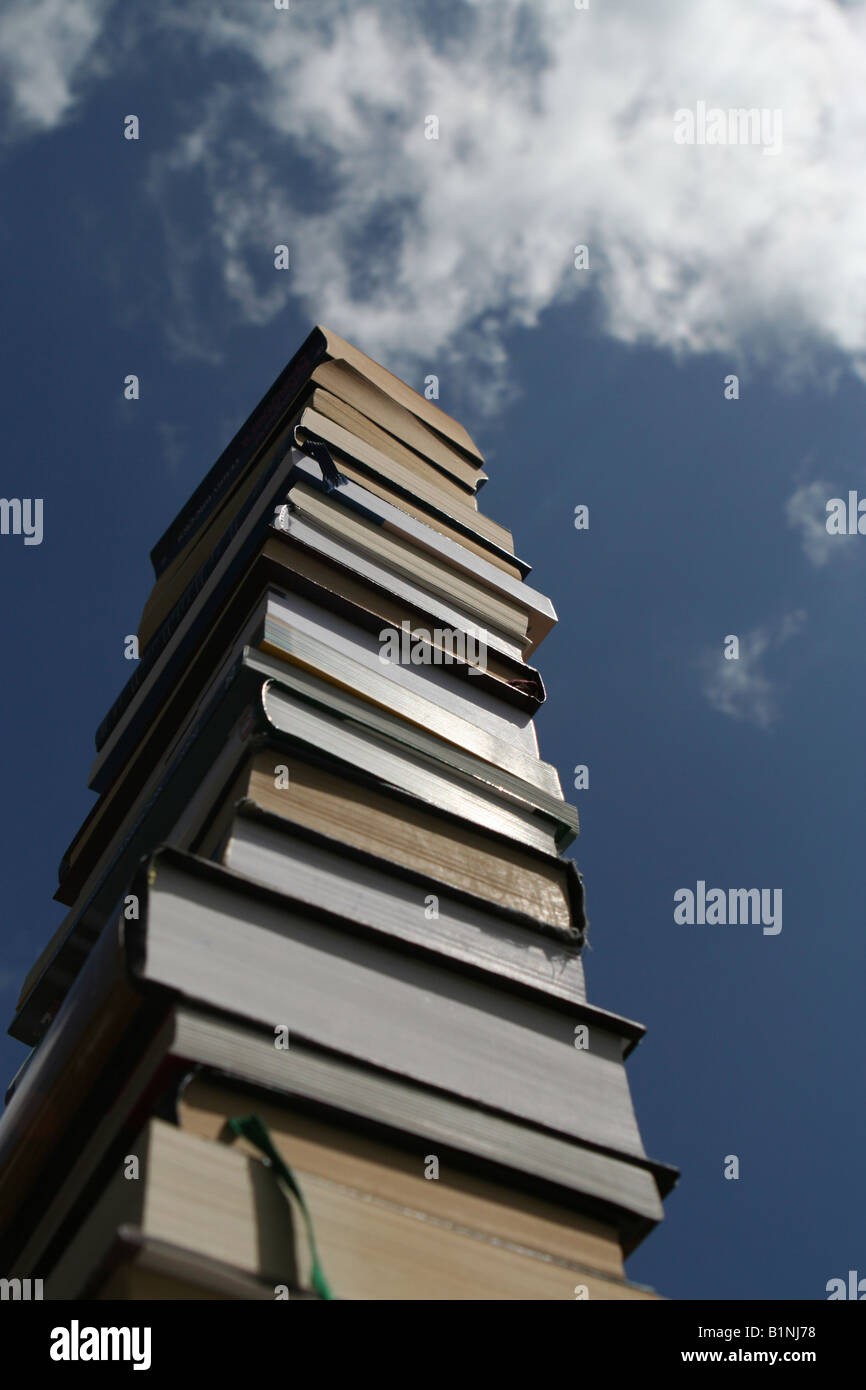 stack of books against a blue sky Stock Photo - Alamy