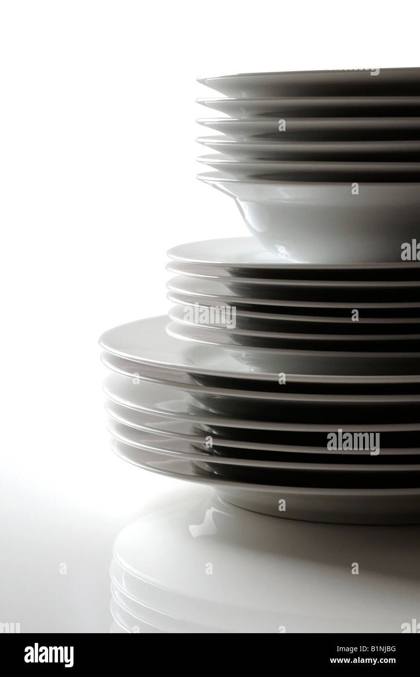 Stack of white china plates Stock Photo - Alamy