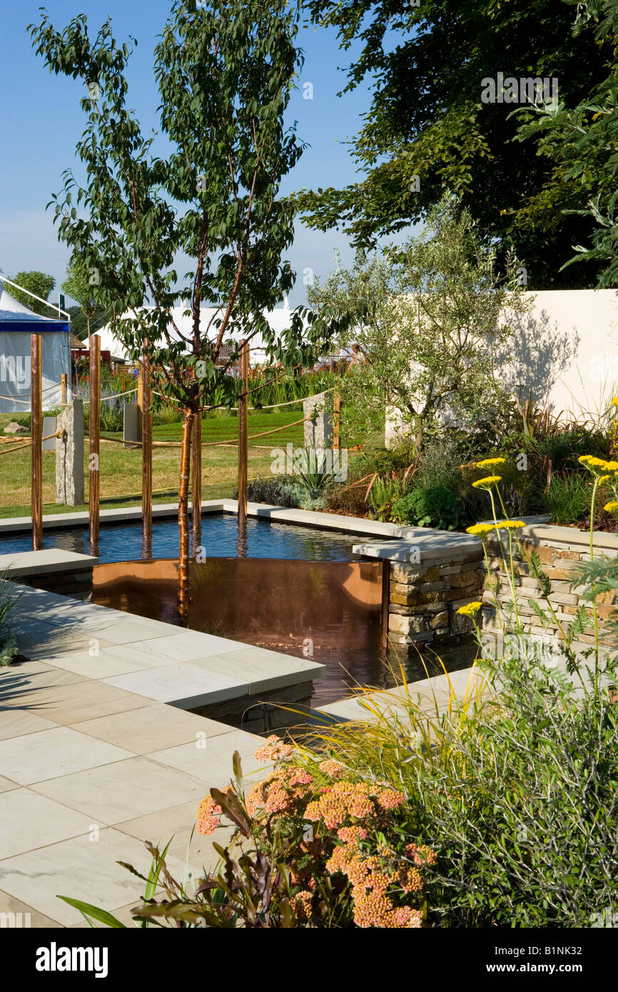 garden pool with copper dam Stock Photo - Alamy