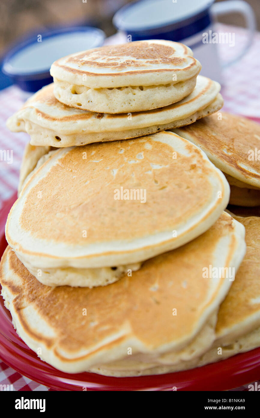 Stack of buttermilk pancakes on picnic table Stock Photo - Alamy
