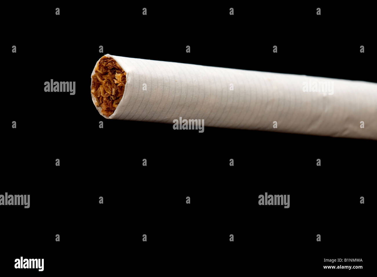object on black cigarette Stock Photo - Alamy