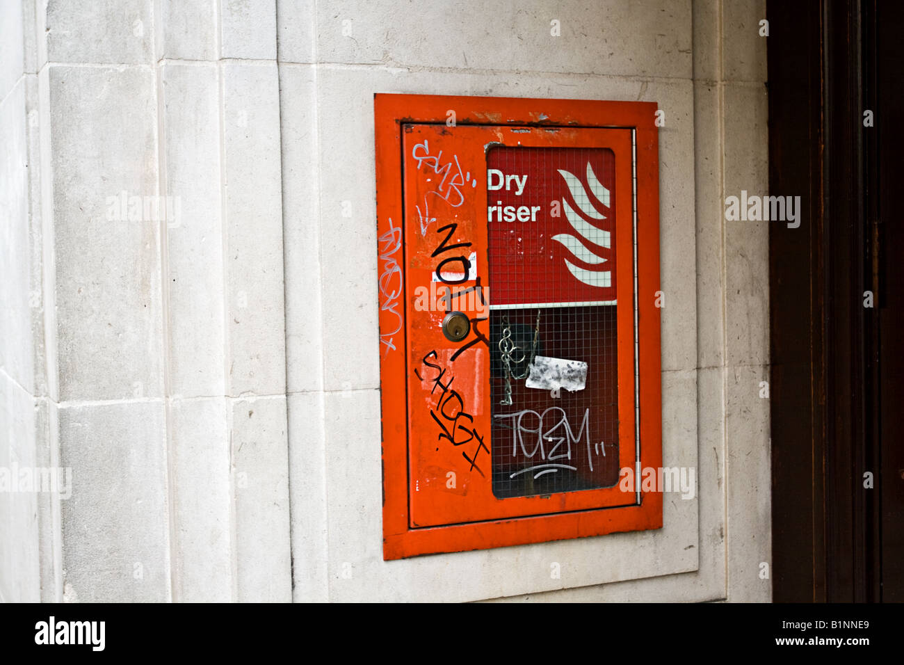 Dry riser in doorway of office building in Soho London U.K Stock Photo ...