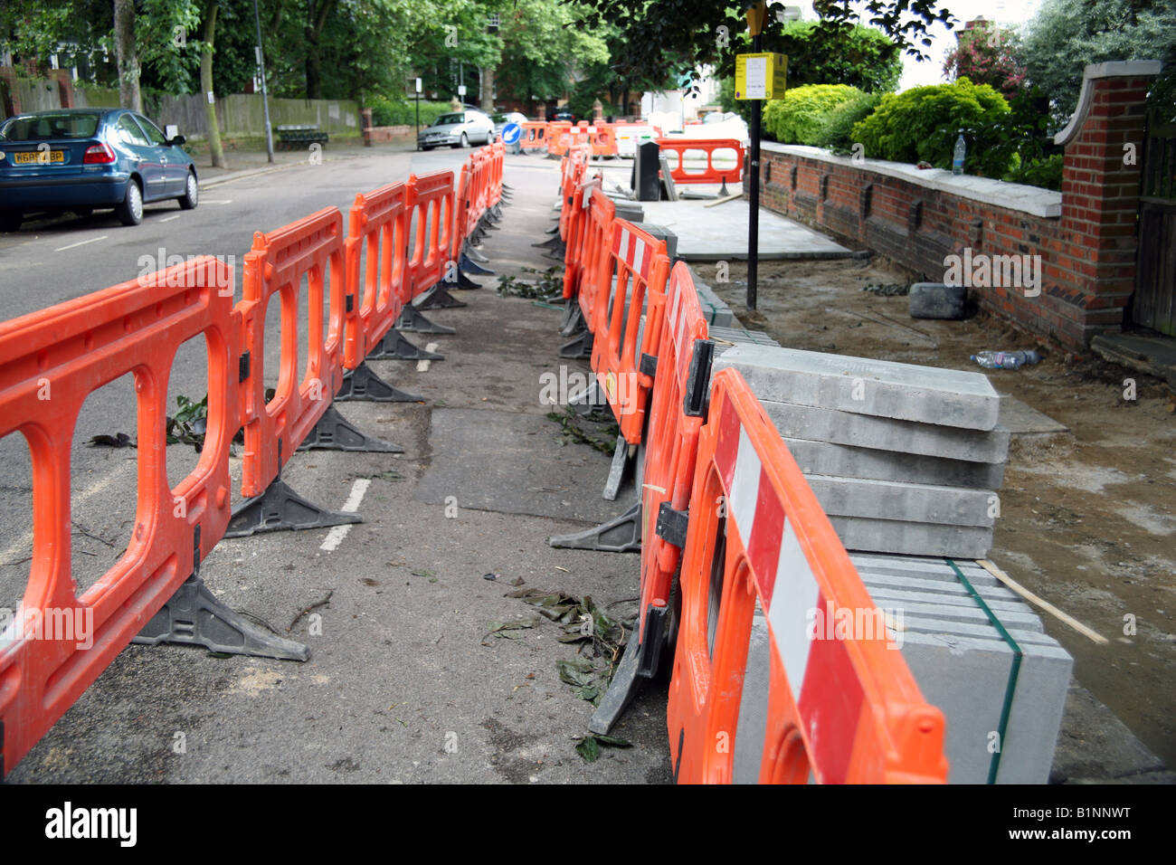 Pavement repair work in London street Stock Photo - Alamy