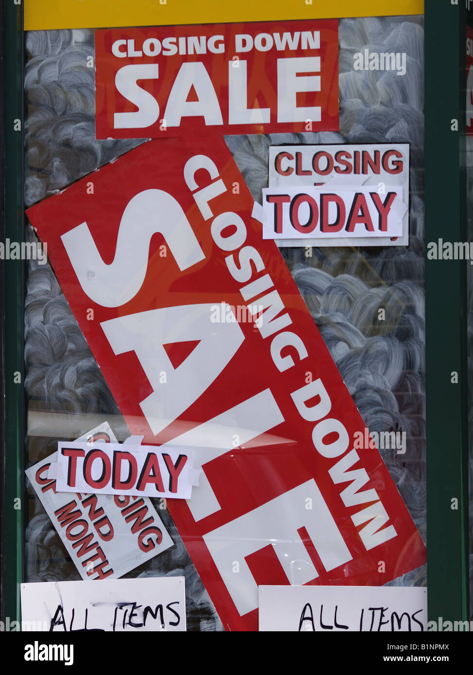 Closing down signs on a shop window Stock Photo - Alamy