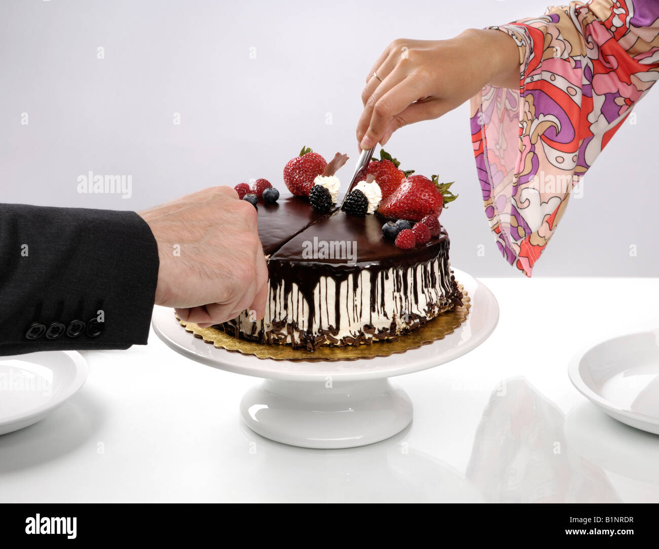 Sharing concept cake hi-res stock photography and images - Alamy