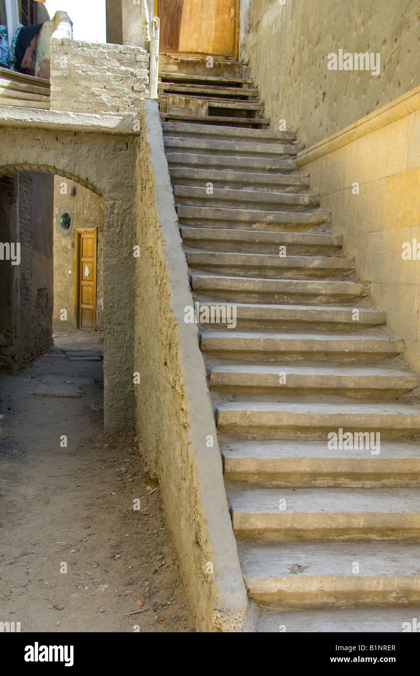 A long staircase and a narrow alley in old town Coptic Cairo Egypt ...