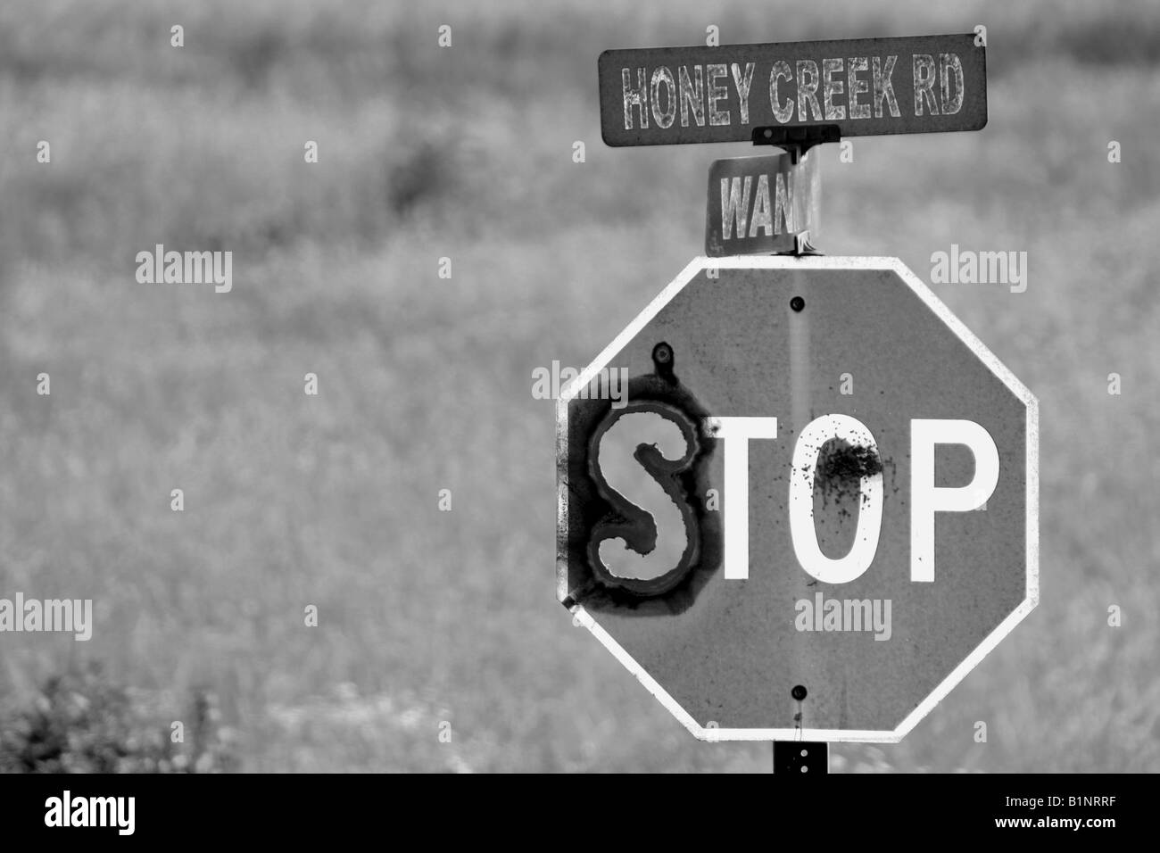 A stop sign in rural Arkansas with the "s" cut out with a cutting torch ...