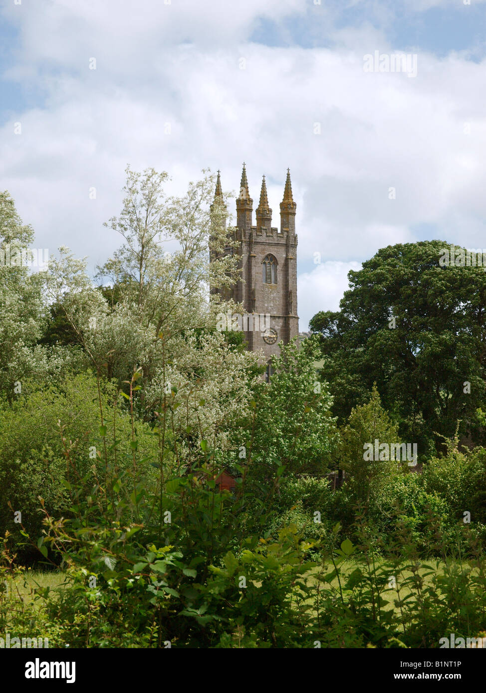 Widecombe church through trees Stock Photo - Alamy