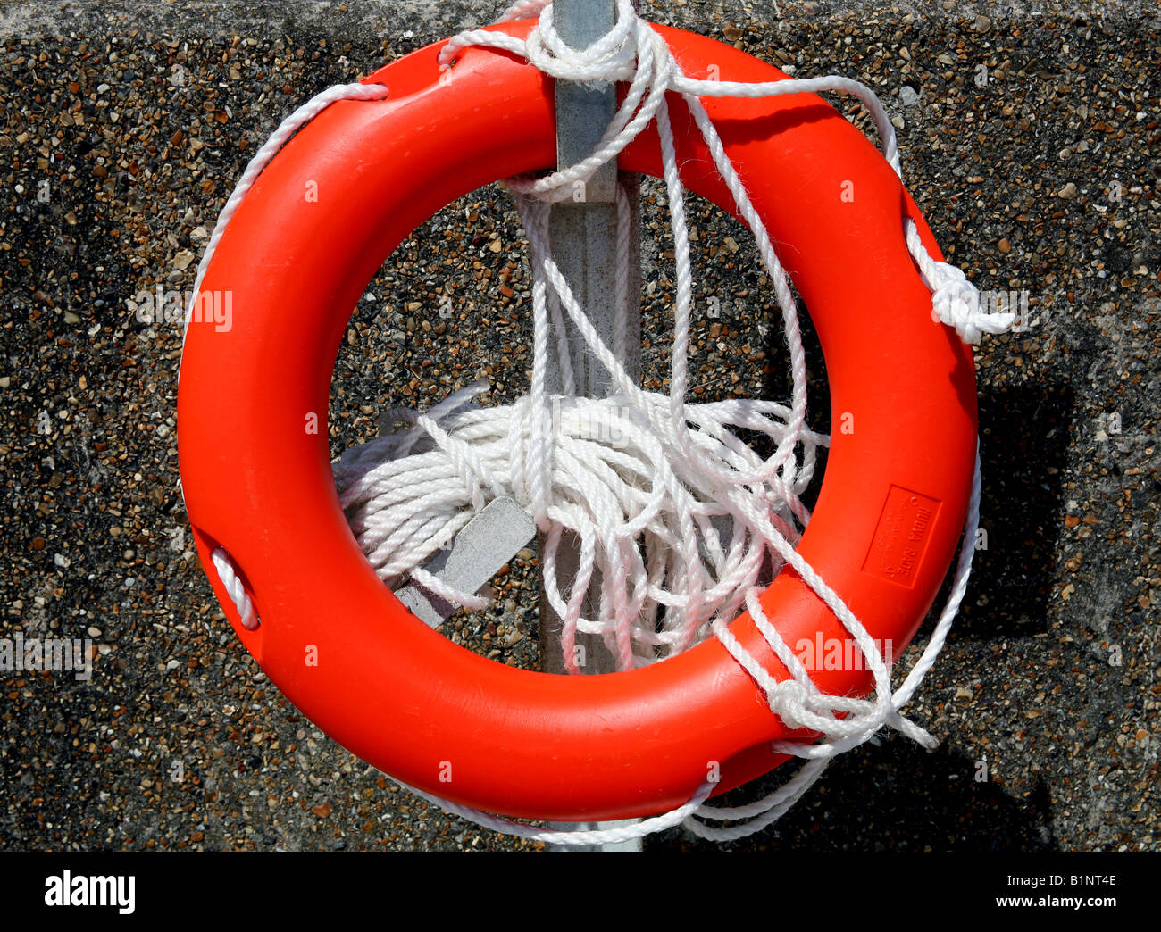 Lifebelt on sea front, England Stock Photo - Alamy