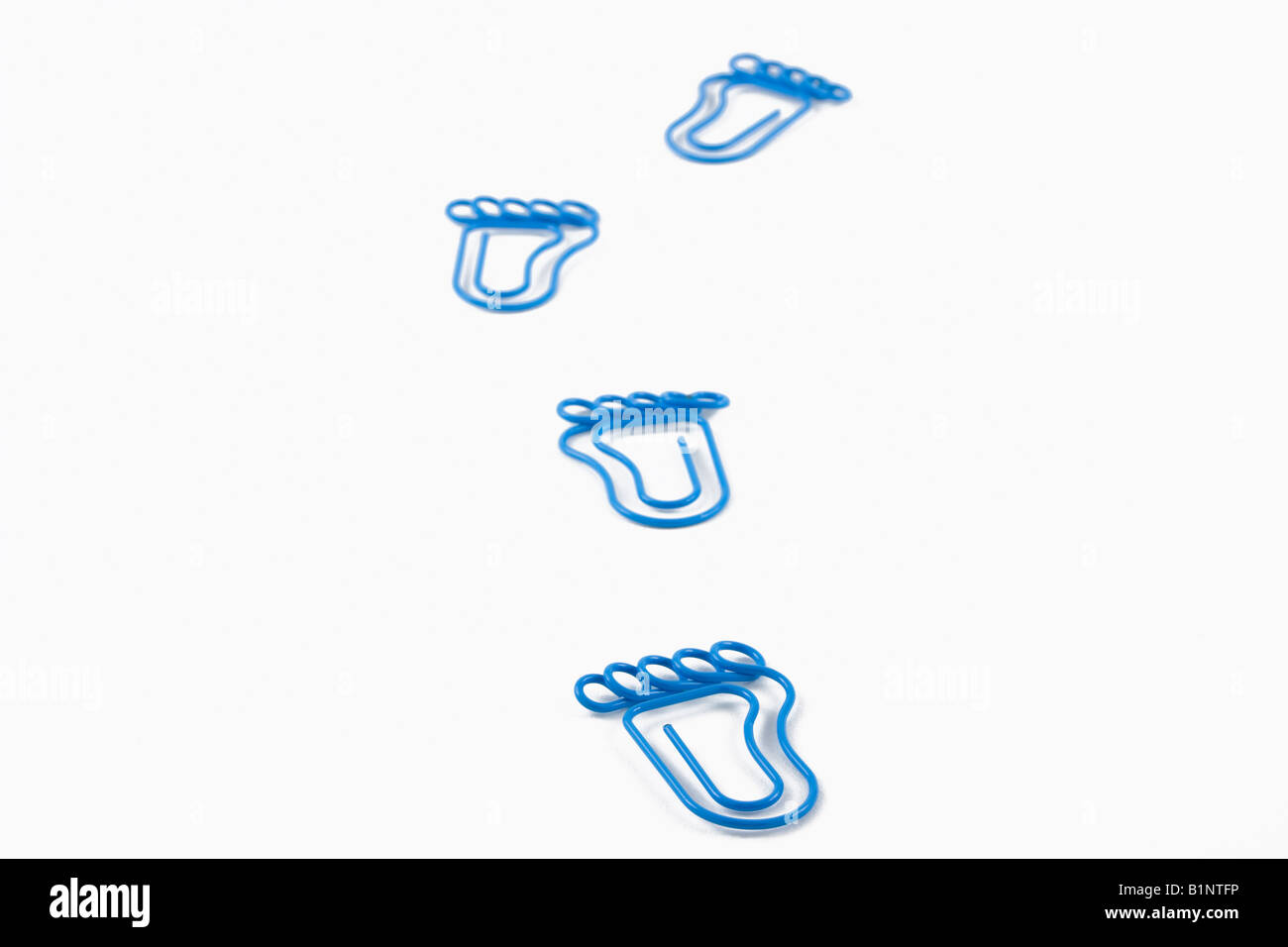 Paper Clip Foot Prints Stock Photo - Alamy