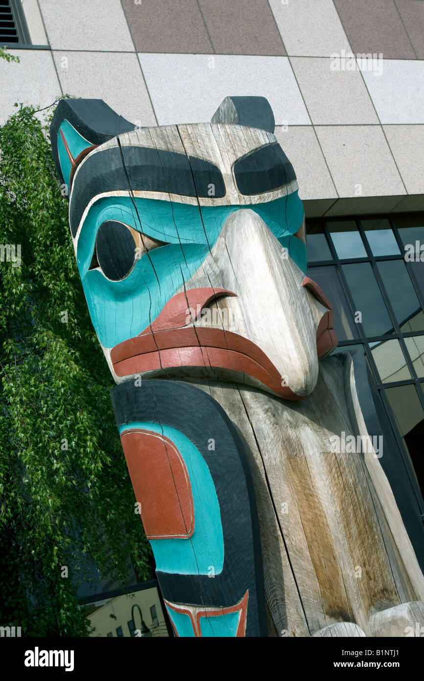 Totem poles in from of Anchorage courthouse, Alaska, USA Stock Photo ...