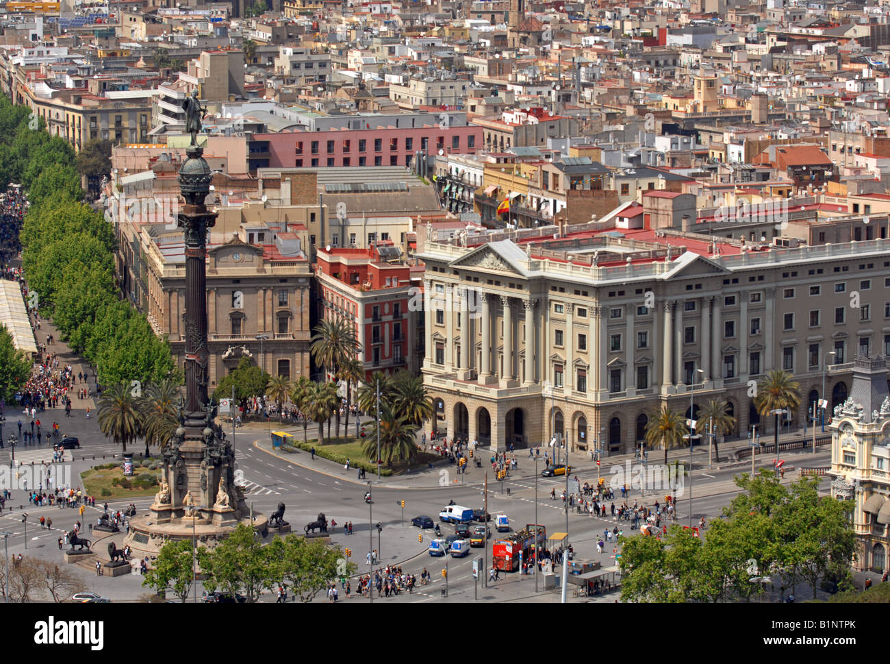 Christopher Columbus column and statue with backdrop of Barcelona city ...